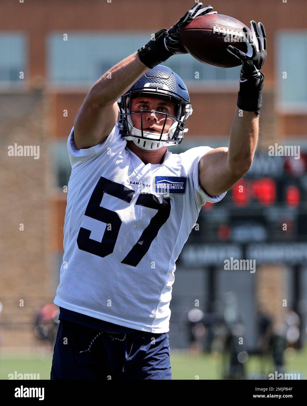 Seattle Seahawks' Cody Barton catches a ball Thursday, June 13, 2019 ...