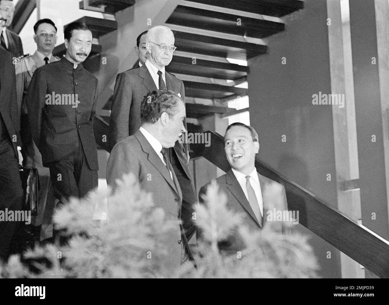 President Richard Nixon faces a smiling South Vietnamese President ...