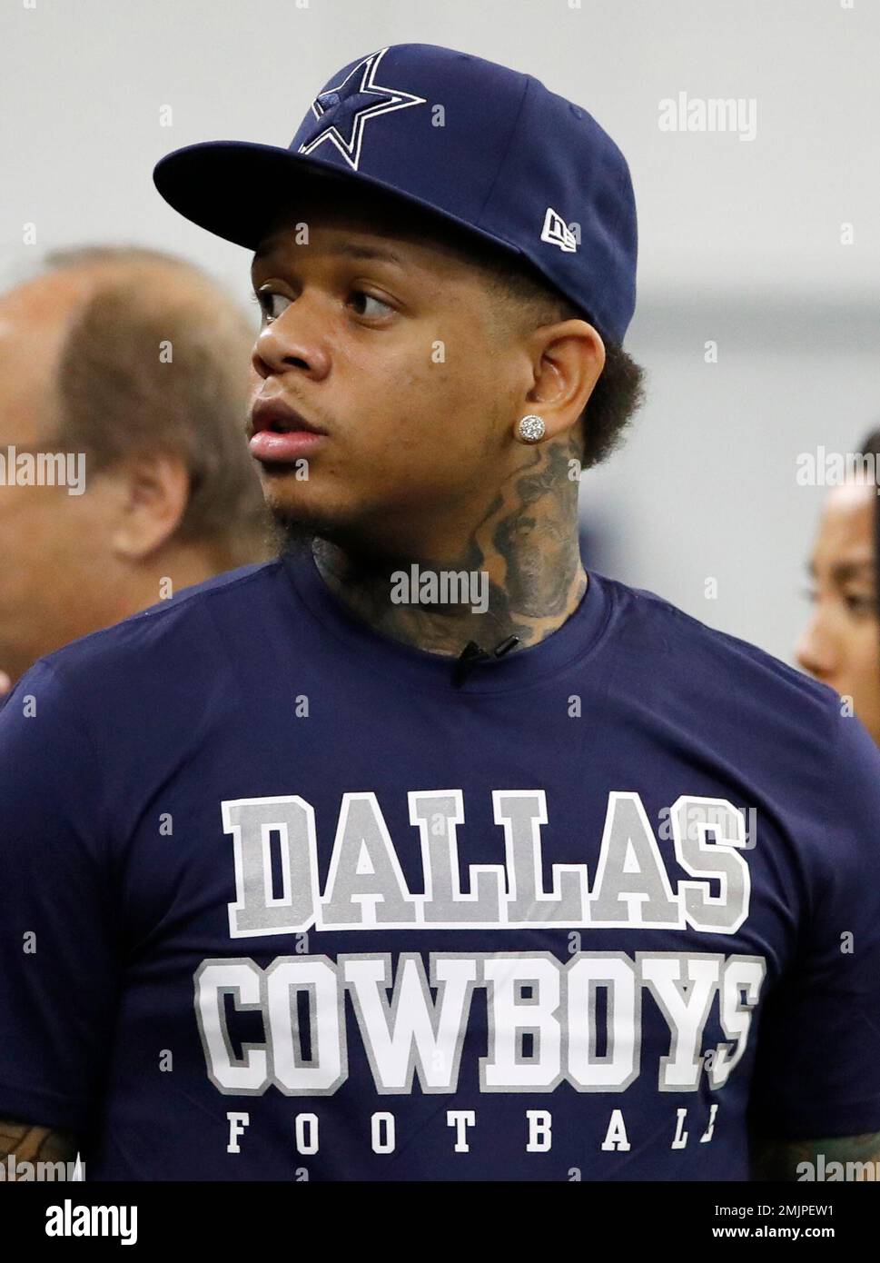Rapper Yella Beezy watches the the Dallas Cowboys run drills at the ...