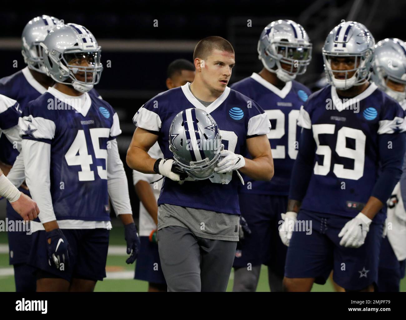 Dallas Cowboys' Andrew Dowell (45), Jeff Heath, center, Christian ...