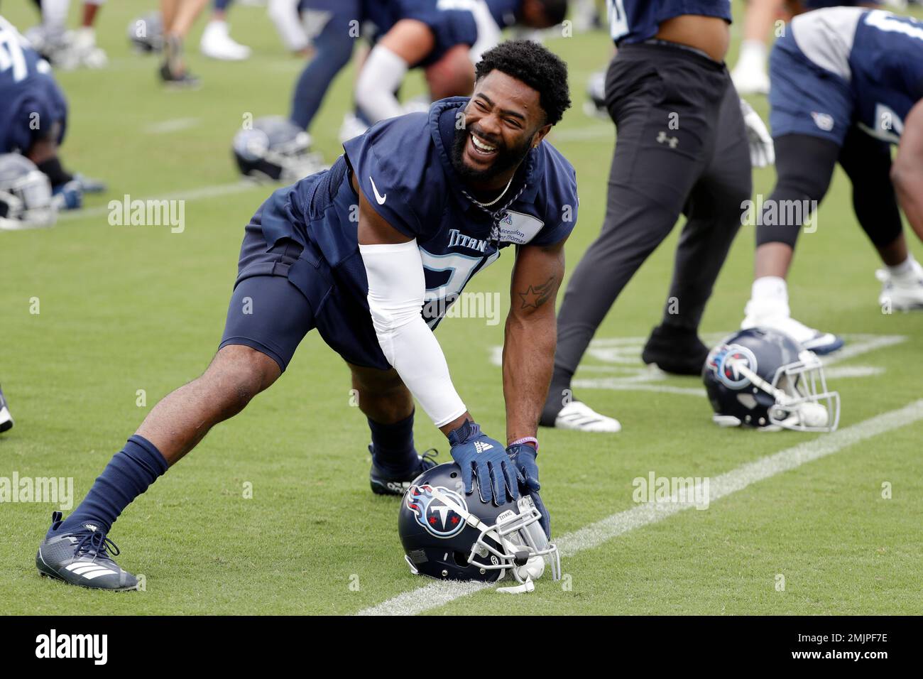 Tennessee Titans cornerback Malcolm Butler warms up during an organized ...