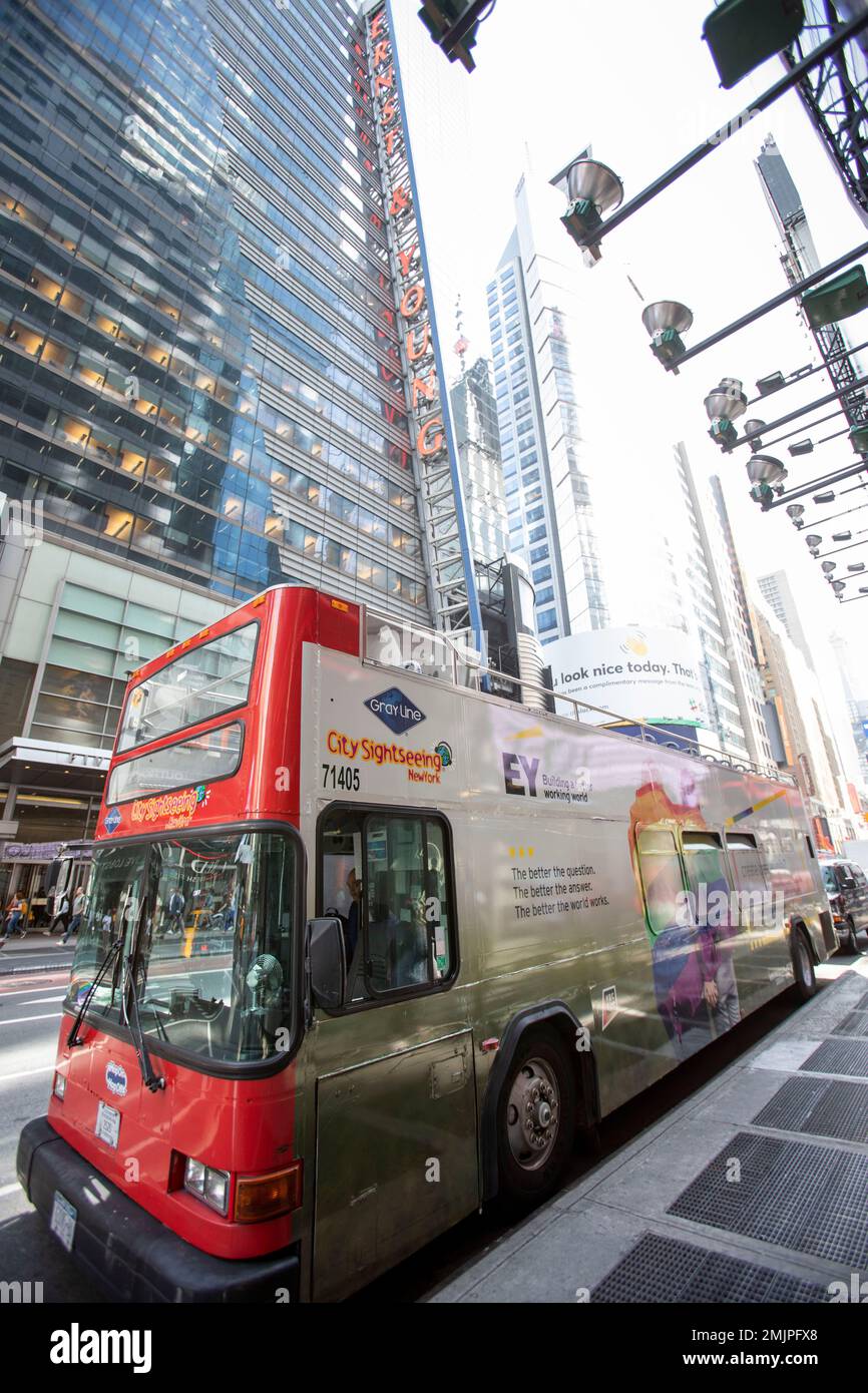 EY Pride bus with Ernst and Young sign in Times Square on Wednesday ...