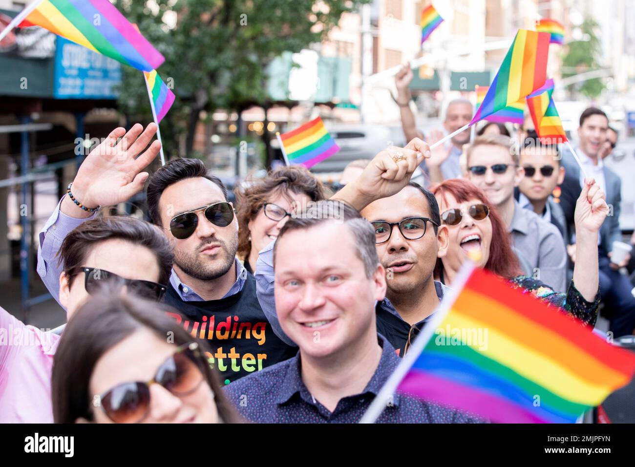 EY employees on the EY bus driving around Manhattan showing their ...