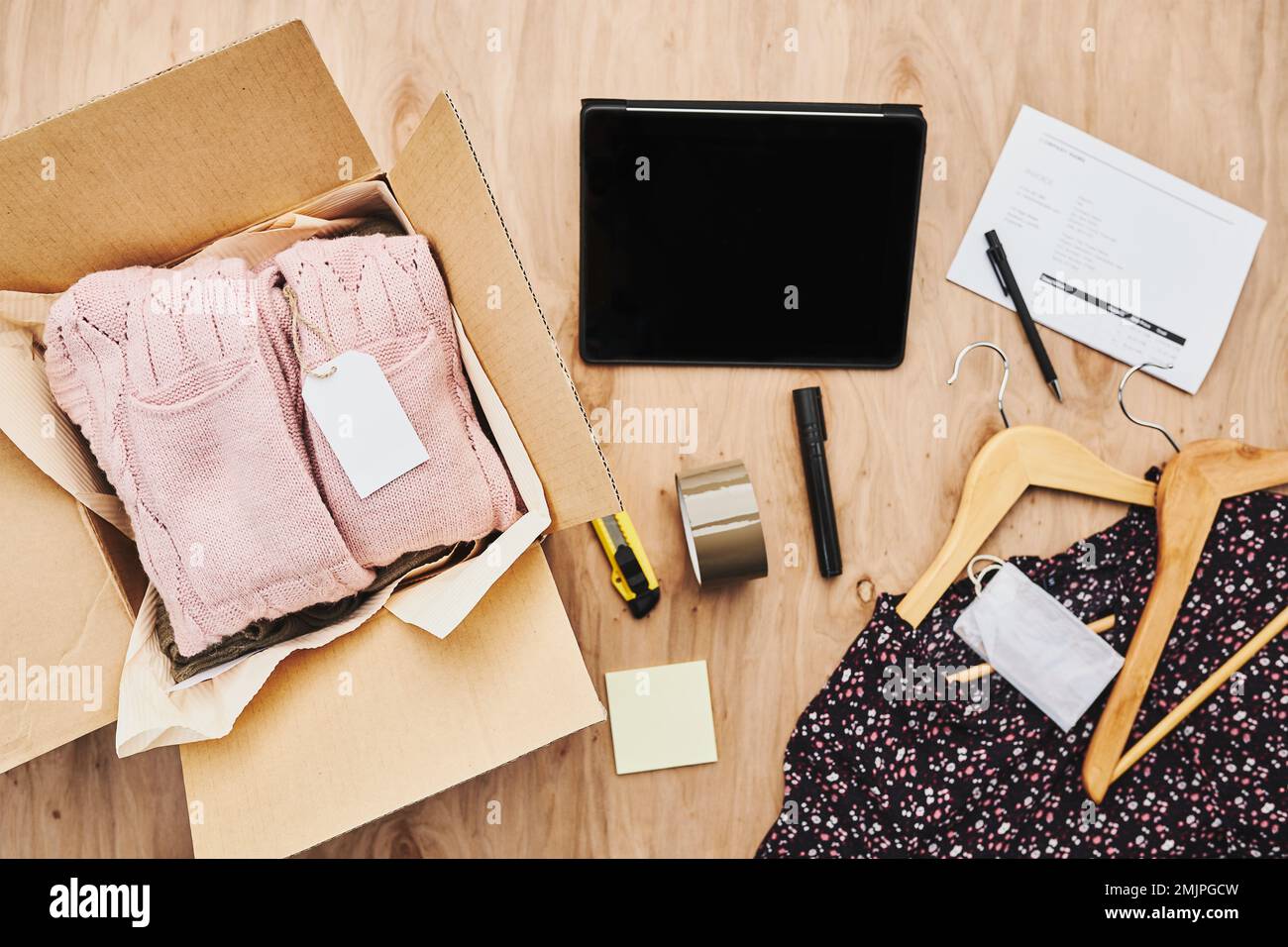 Opening clothing parcel hi-res stock photography and images - Alamy