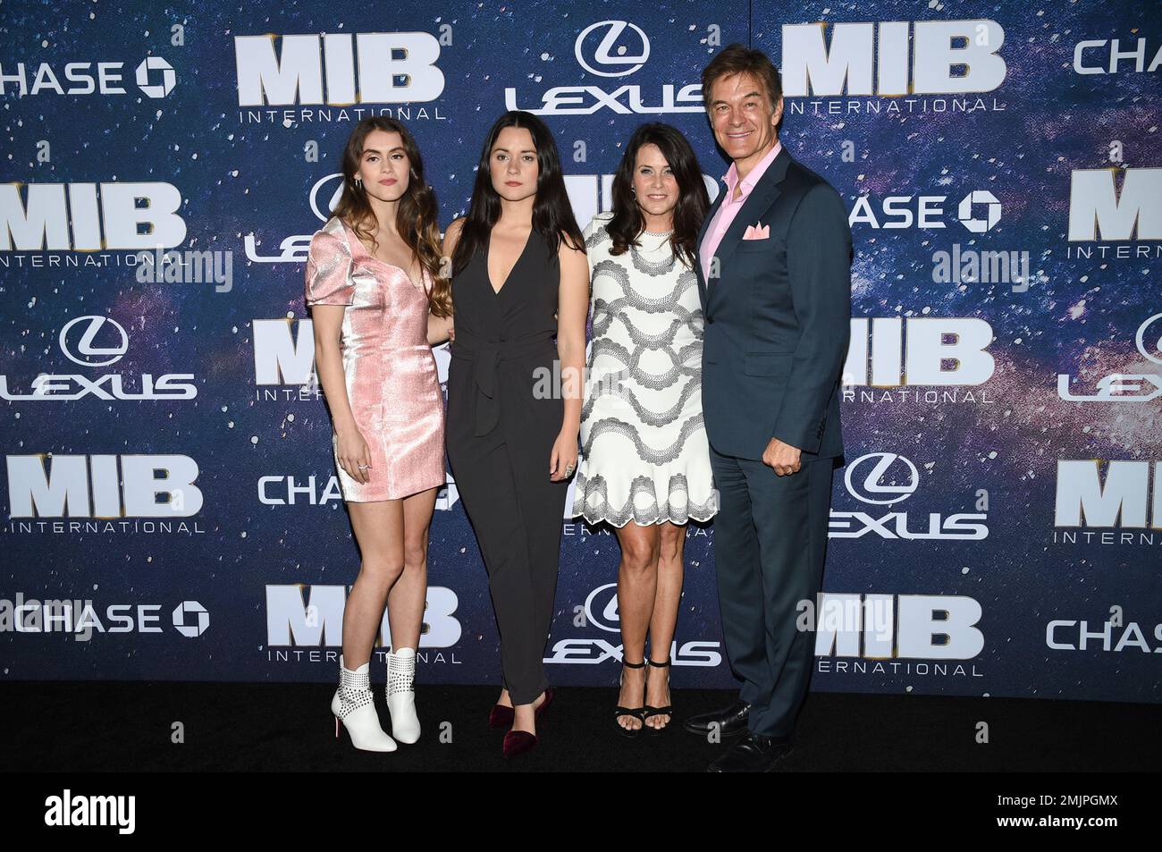 Dr. Mehmet Oz, right, and wife Lisa pose with there daughters Daphne Oz ...