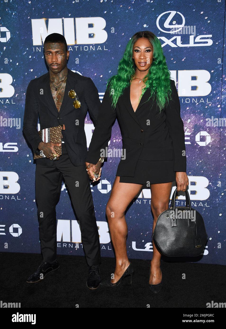 Yves Mathieu, left, and Mila Jam attend the world premiere of "Men in ...