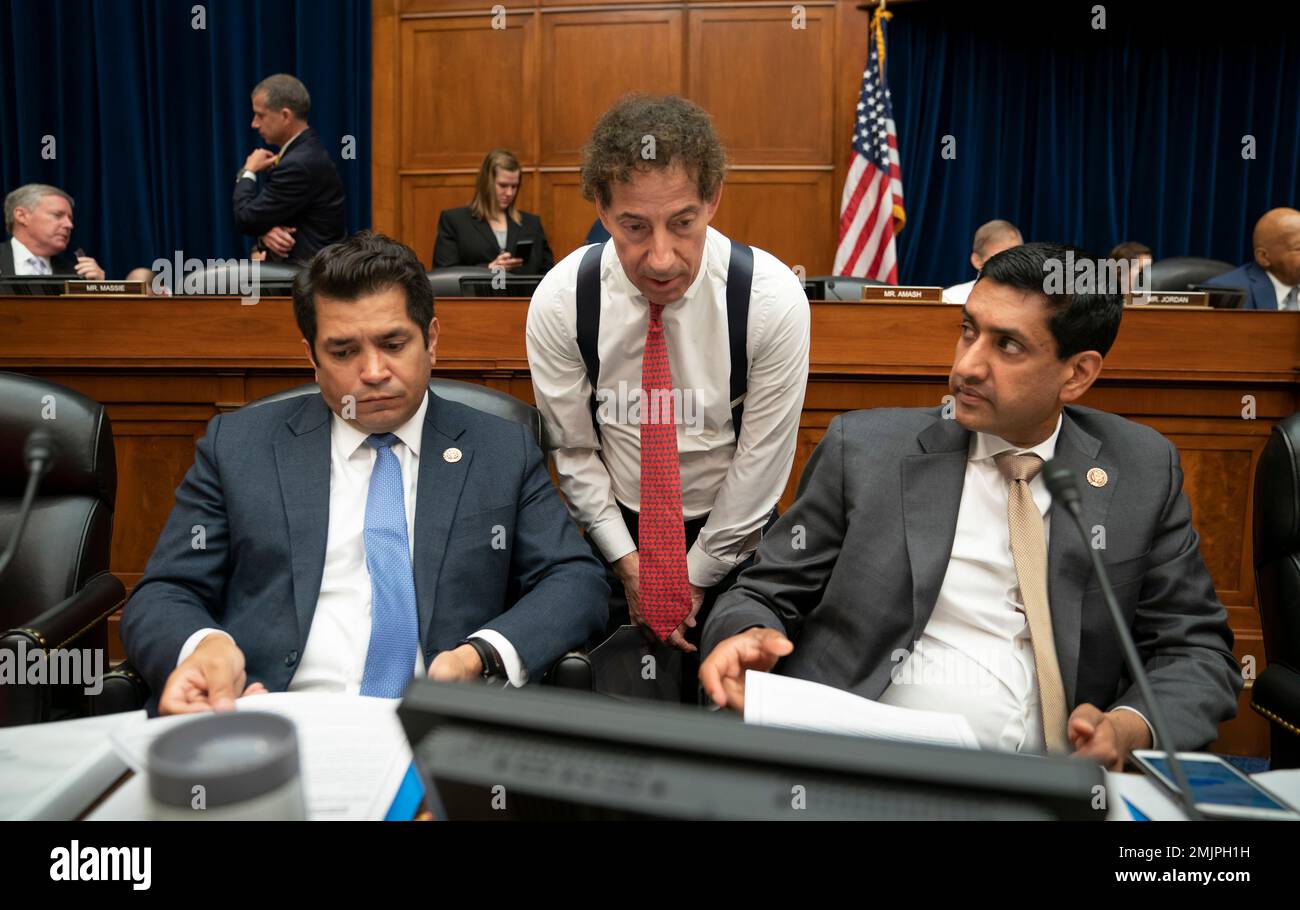 Rep. Jamie Raskin, D-Md., center, speaks with Rep. Jimmy Gomez, D-Calif ...