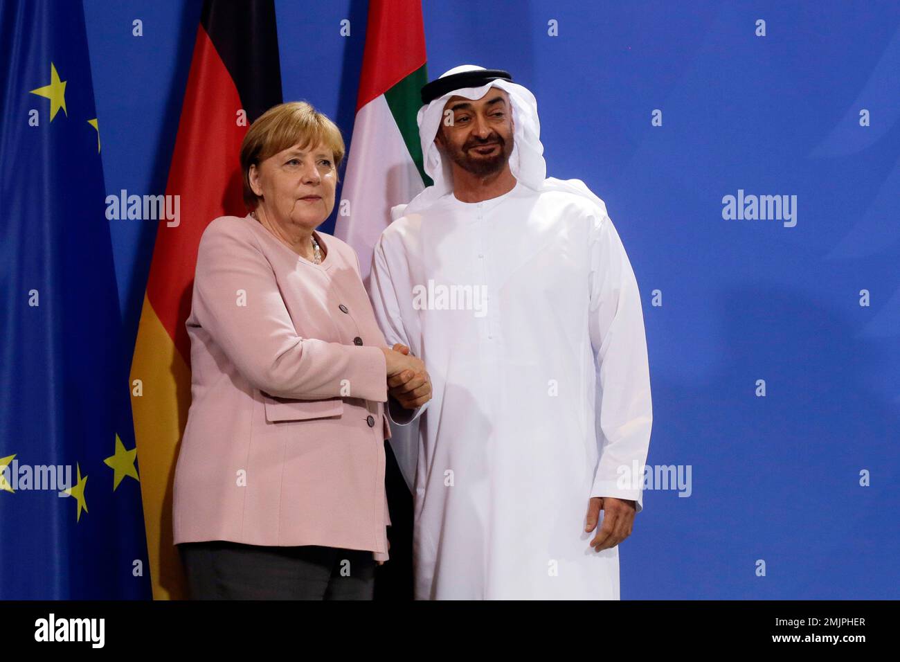 German Chancellor Angela Merkel, left, and Abu Dhabi's Crown Prince ...