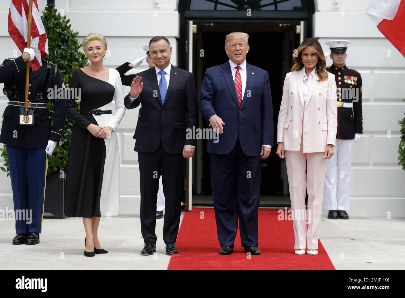President Donald Trump and first lady Melania Trump greet Polish ...