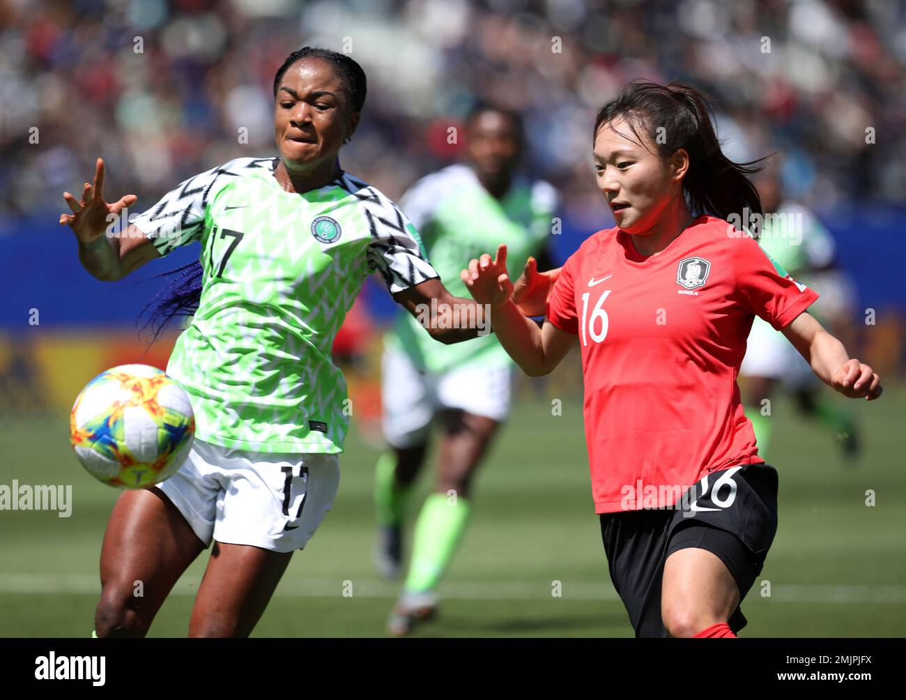 South Korea's Jang Sel-gi, right, challenges Nigeria's Francisca Ordega ...