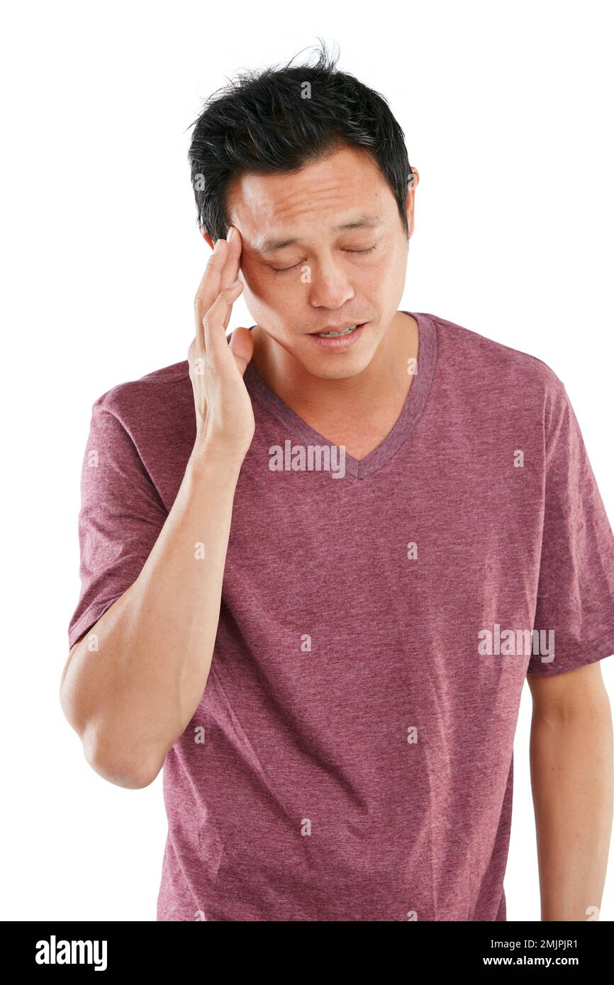 This headache just wont quit. Studio shot of a young man holding his ...
