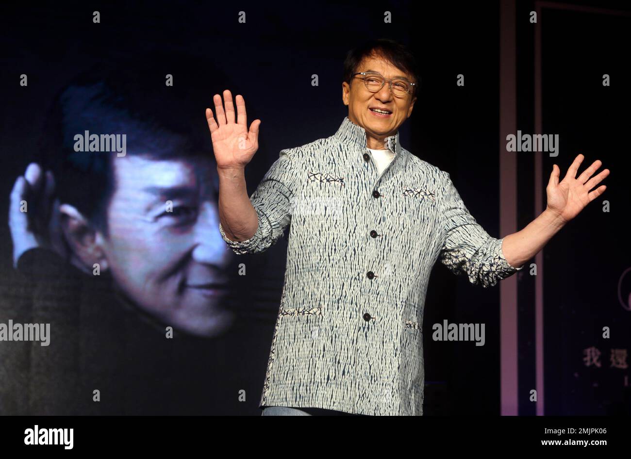 Hong Kong actor and singer Jackie Chan poses for media during a ...
