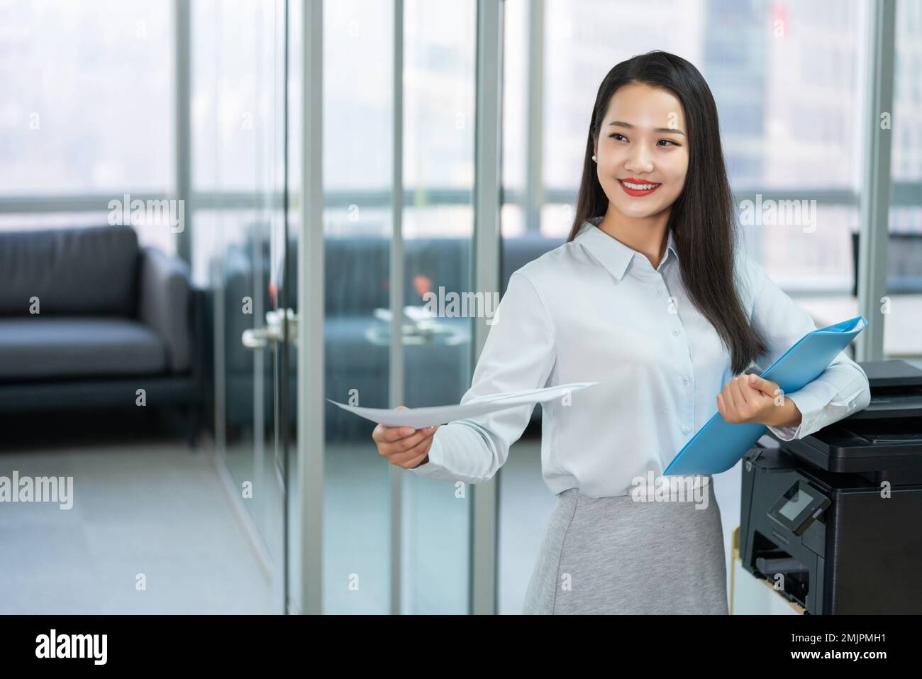 A young business woman Stock Photo - Alamy