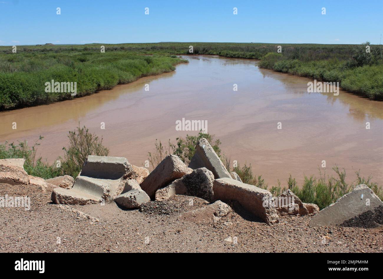 The Little Colorado River flows in along a levee Aug. 31 in Winslow ...