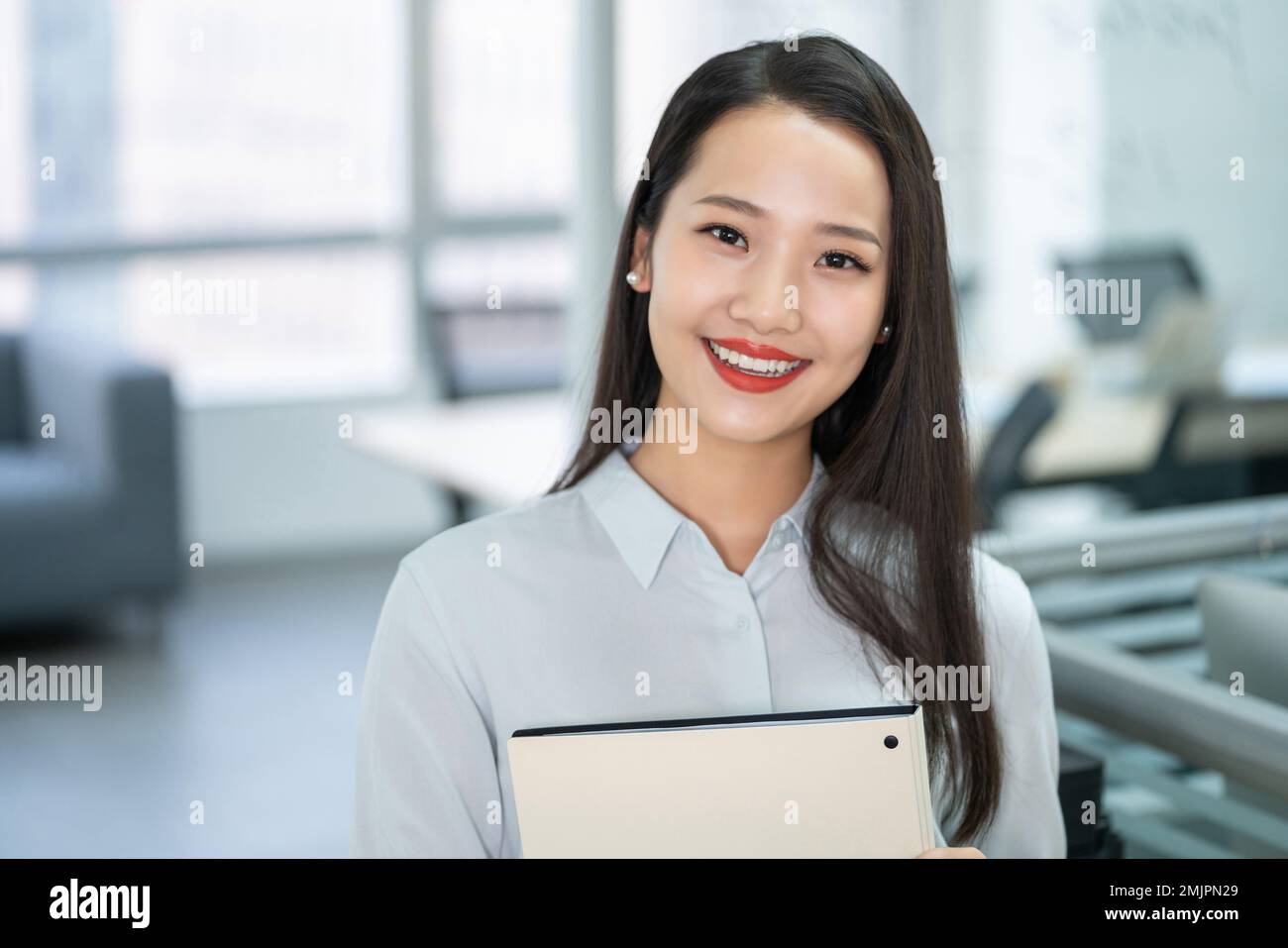 Holding a documents folder hi-res stock photography and images - Alamy