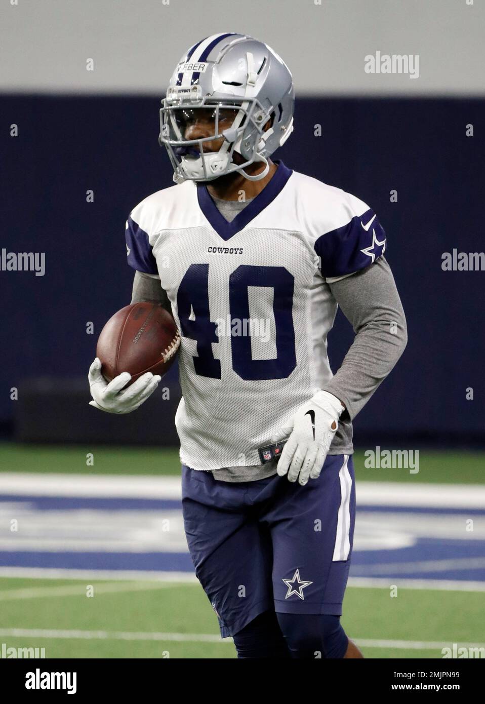 Dallas Cowboys running back Mike Weber (40) jogs up field during drills ...
