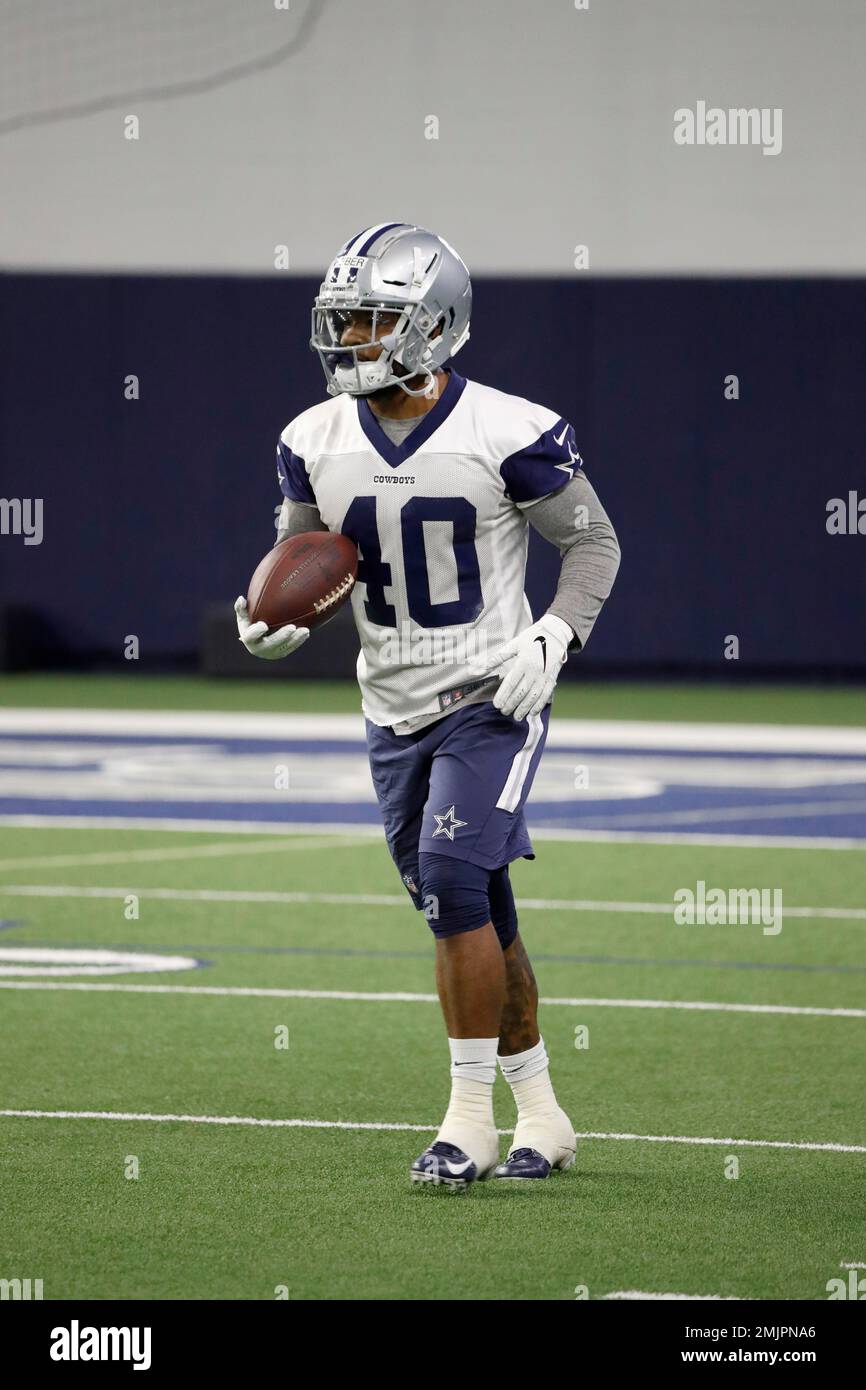 Dallas Cowboys running back Mike Weber (40) jogs up field during drills ...