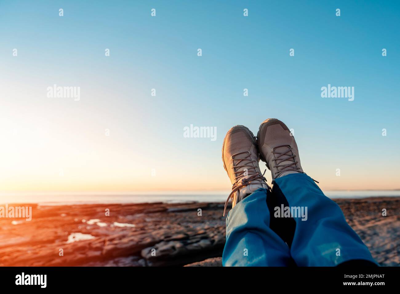 Male hiker relaxing sunset hi-res stock photography and images - Alamy