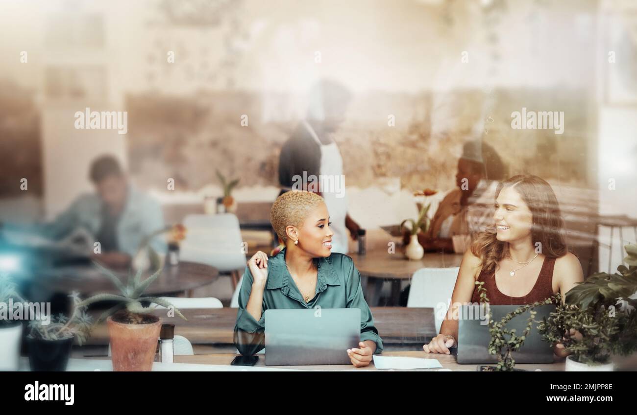 Meeting, laptop and business women in cafe for planning, discussion and ...