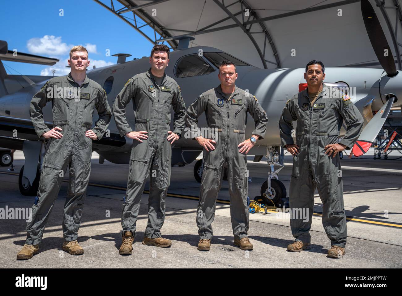 From left, Senior Airman Max Sohlberg, 25th Intelligence Squadron ...