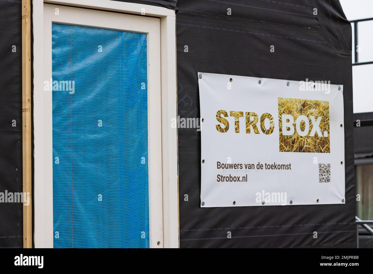 Olst Wijhe, The Netherlands - January 21, 2023: Construction with straw ...