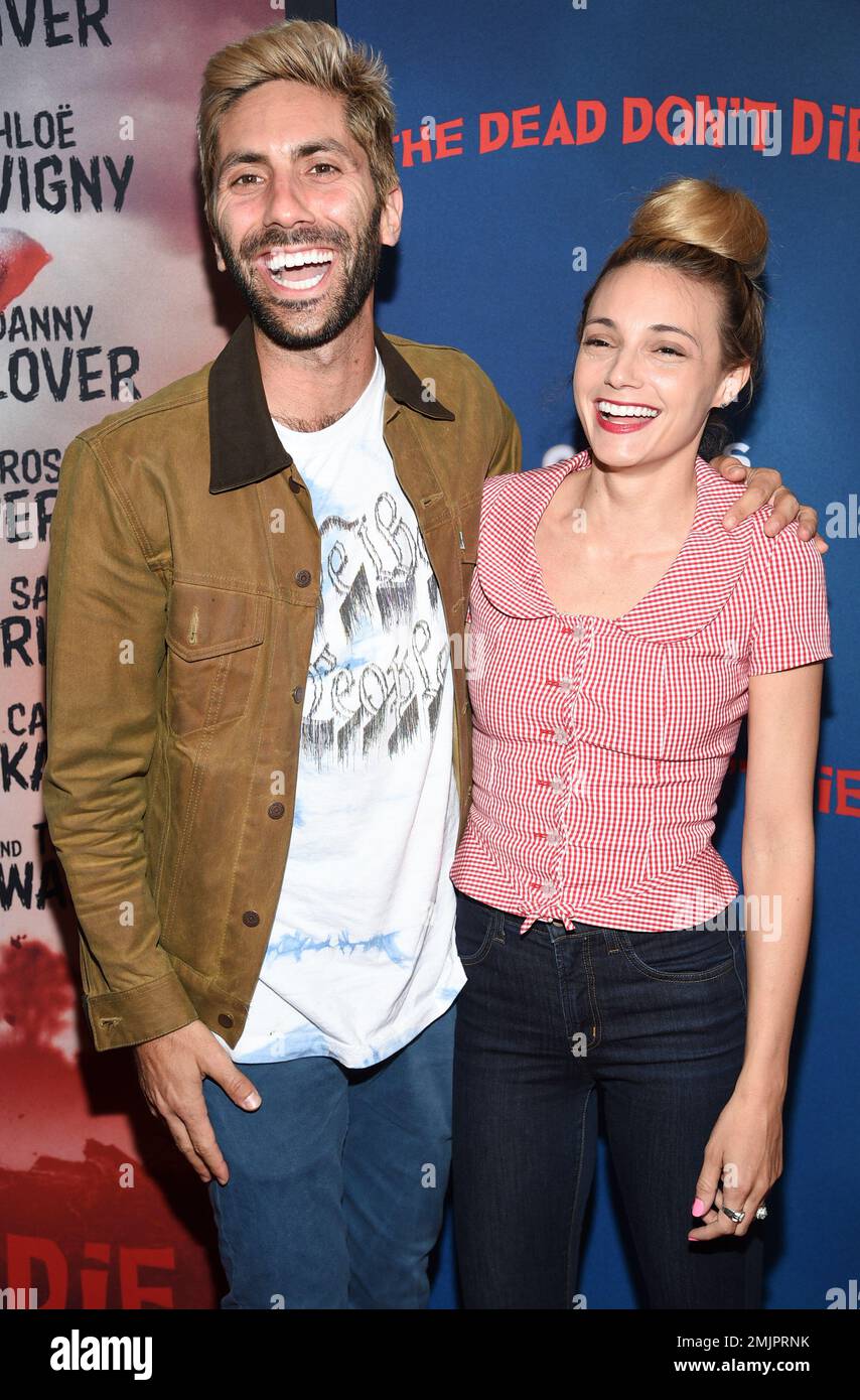 Nev Schulman, left, and Laura Perlongo attend the premiere of "The Dead ...