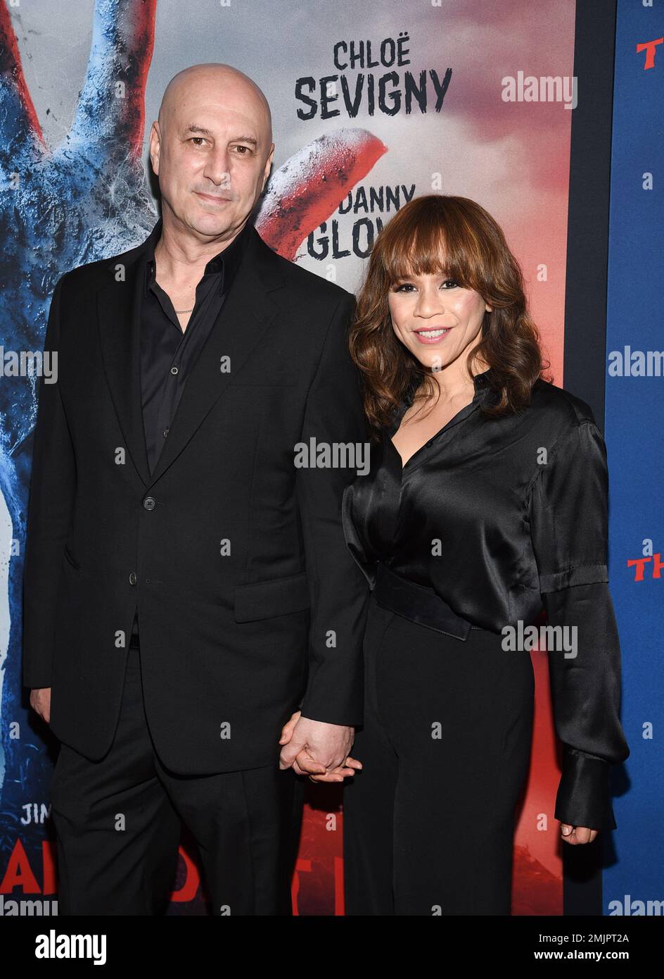 Actress Rosie Perez, right, and husband Eric Haze attend the premiere ...