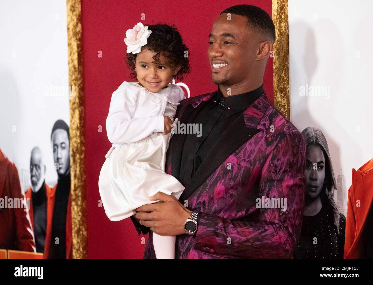 Jessie T. Usher and daughter attend the premiere of "Shaft" at AMC ...