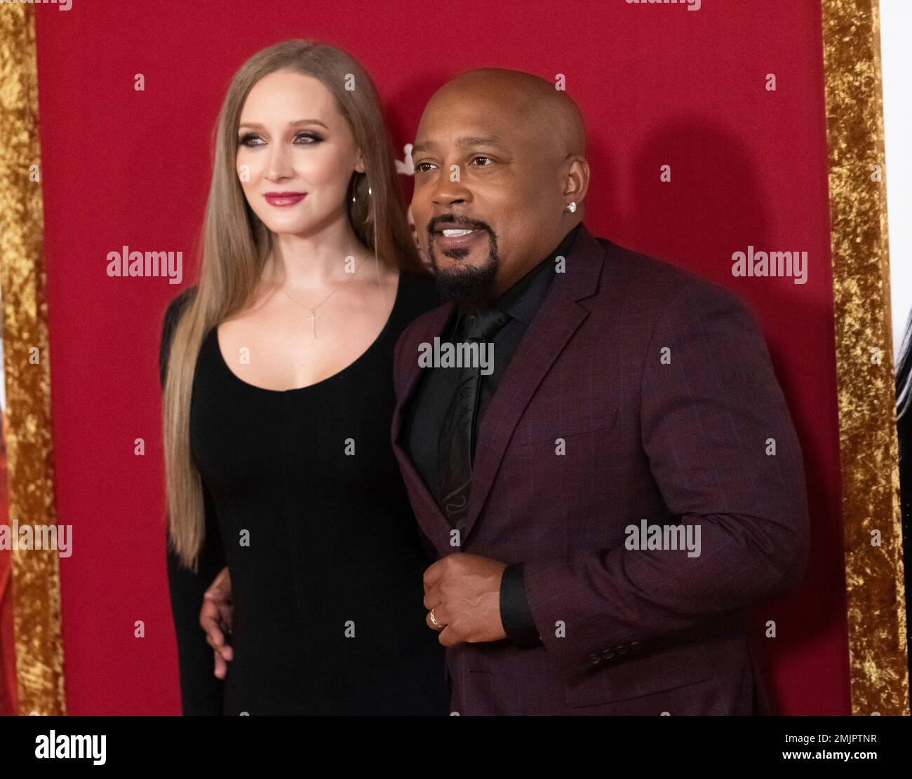 Heather Taras and Daymond John attend the premiere of "Shaft" at AMC ...