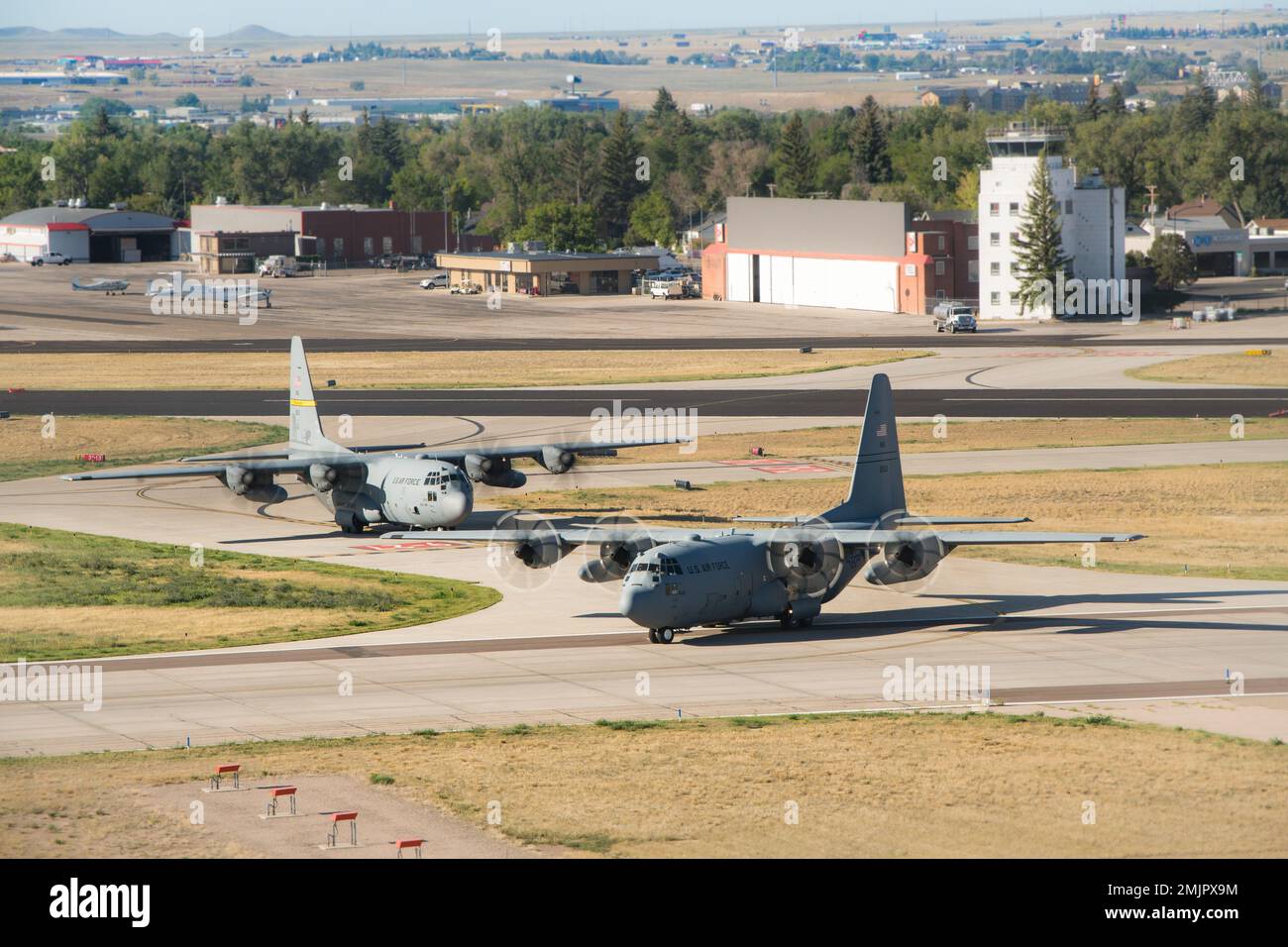 Two C-130 Hercules aircraft assigned to the 153d Airlift Wing, Wyoming ...