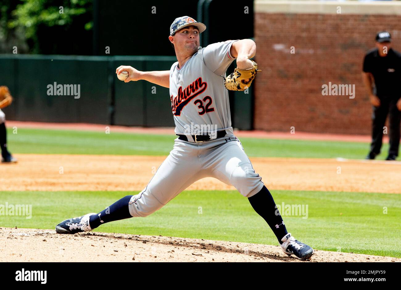 Auburn's Tanner Burns (32) pitches during an NCAA college super ...