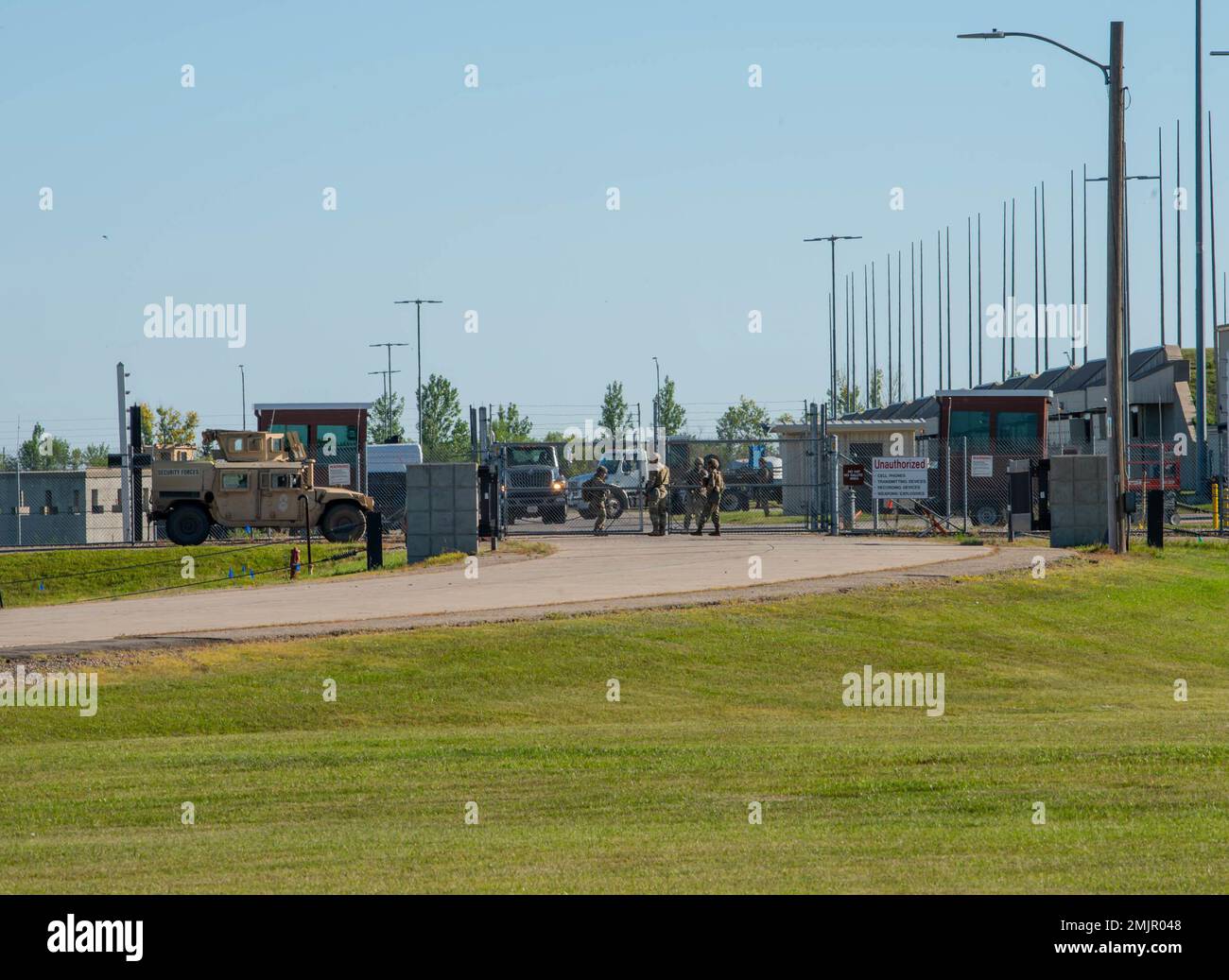 A 705th Munitions Squadron and 5th Security Forces Squadron convoy ...