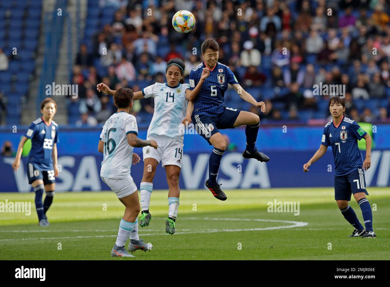 Japan's Hina Sugita, top right, goes for a header with Argentina's ...
