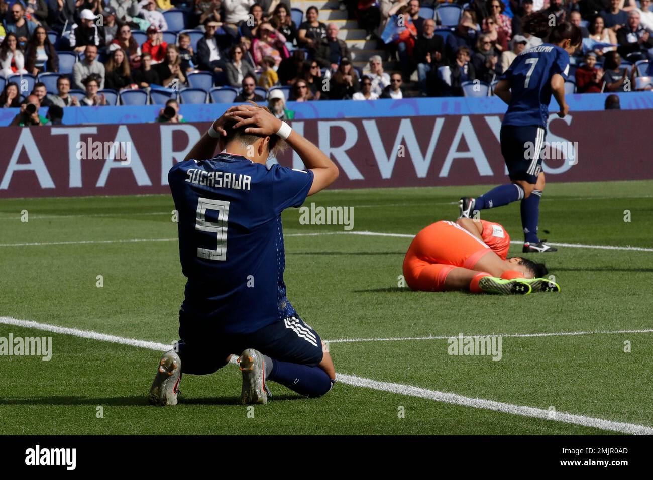 Japan's Yuika Sugasawa, left, gestures after missing a chance against ...