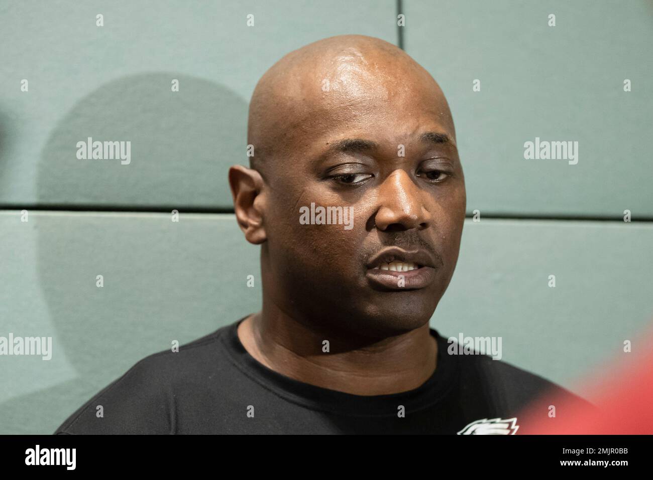 Philadelphia Eagles defensive line coach Phillip Daniels speaks with ...