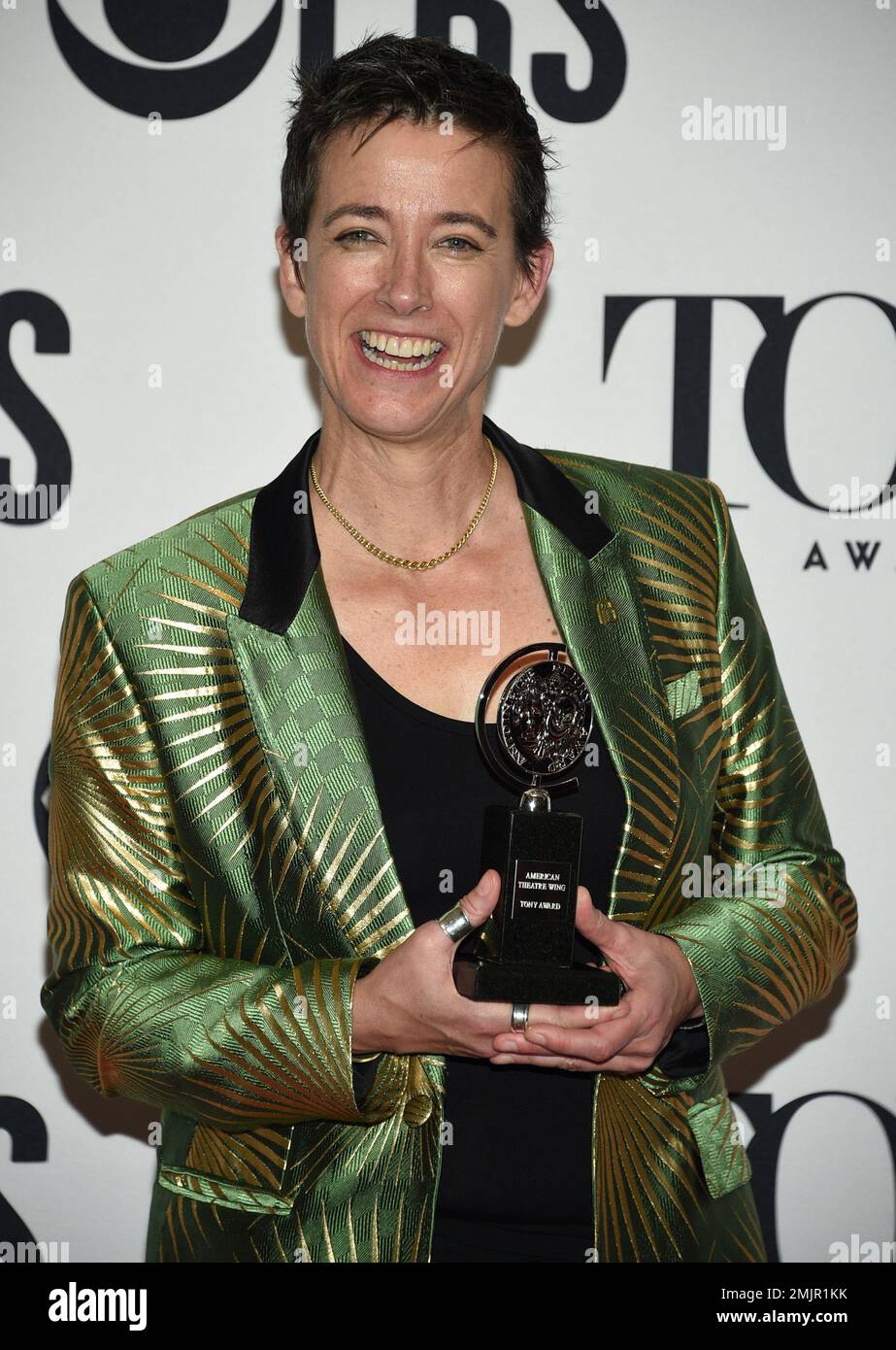 Rachel Hauck poses in the press room with the award for scenic design ...