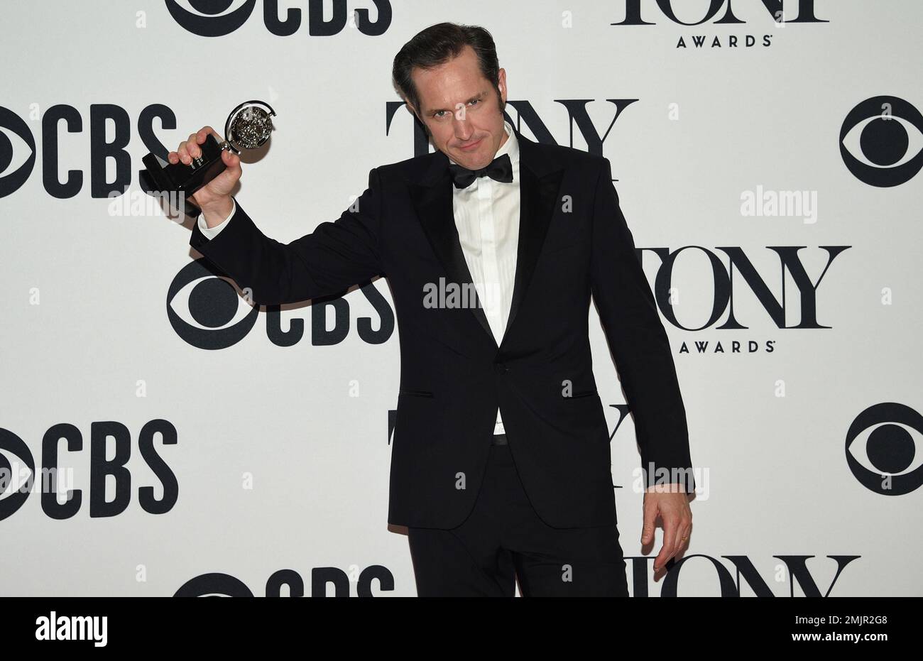 Bertie Carvel poses in the press room with the award for best ...