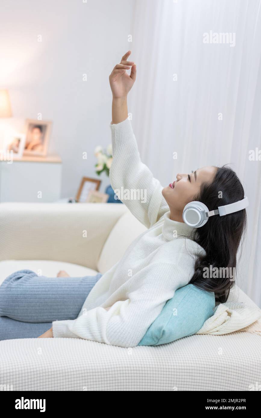 The young woman at home to enjoy leisure time Stock Photo - Alamy