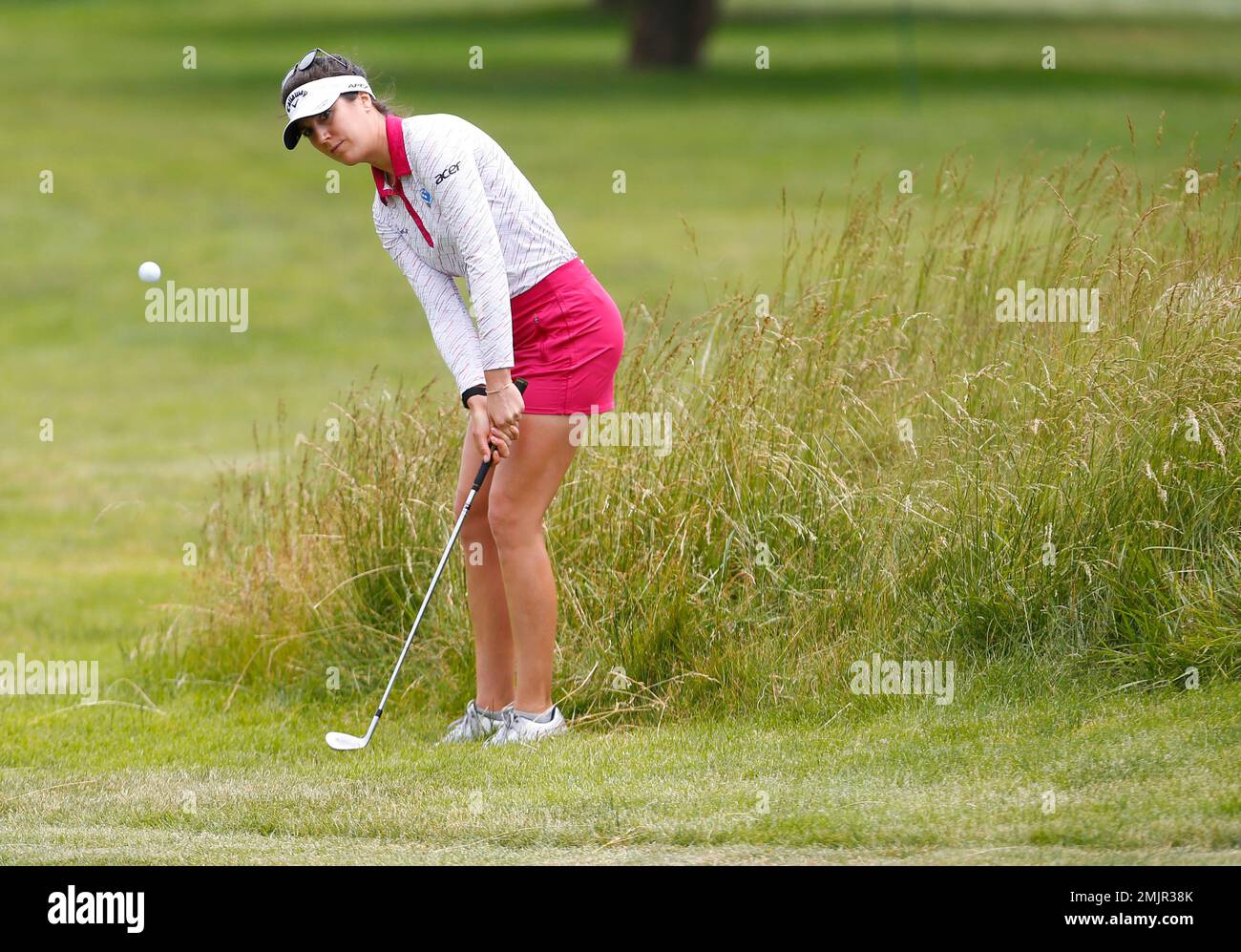 Sandra Gal hits the ball from the rough at the third hole during final ...