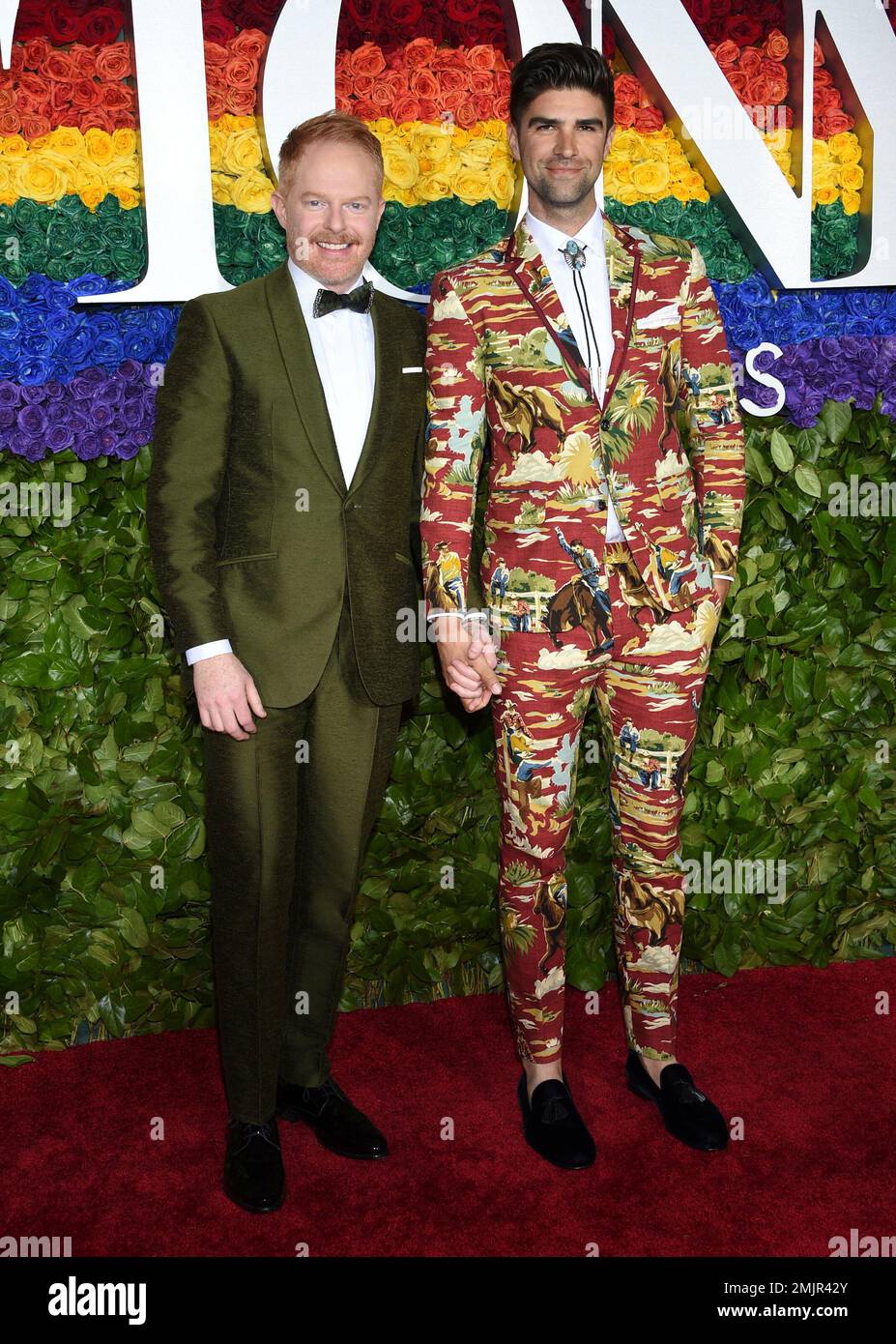 Jesse Tyler Ferguson, left, Justin Mikita arrive at the 73rd annual ...