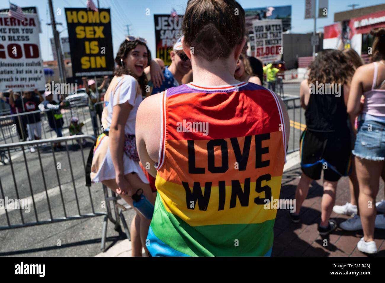 Participants in the annual 49th annual Pride Parade take photos of each ...