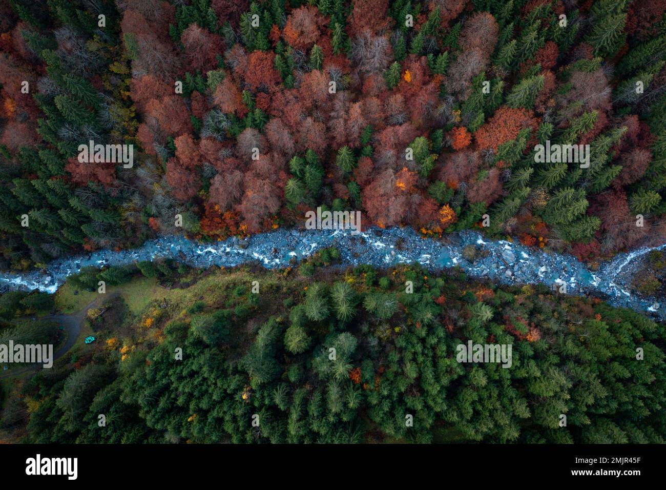 colorful conifers with a creek in autumn photographed from above Stock ...