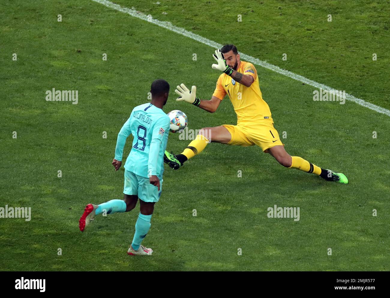Portugal goalkeeper Rui Patricio, right, makes a save in front of ...