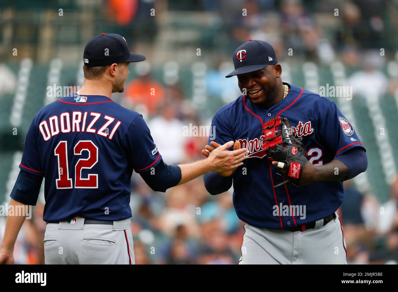 Minnesota Twins pitcher Jake Odorizzi (12) congratulates third baseman ...
