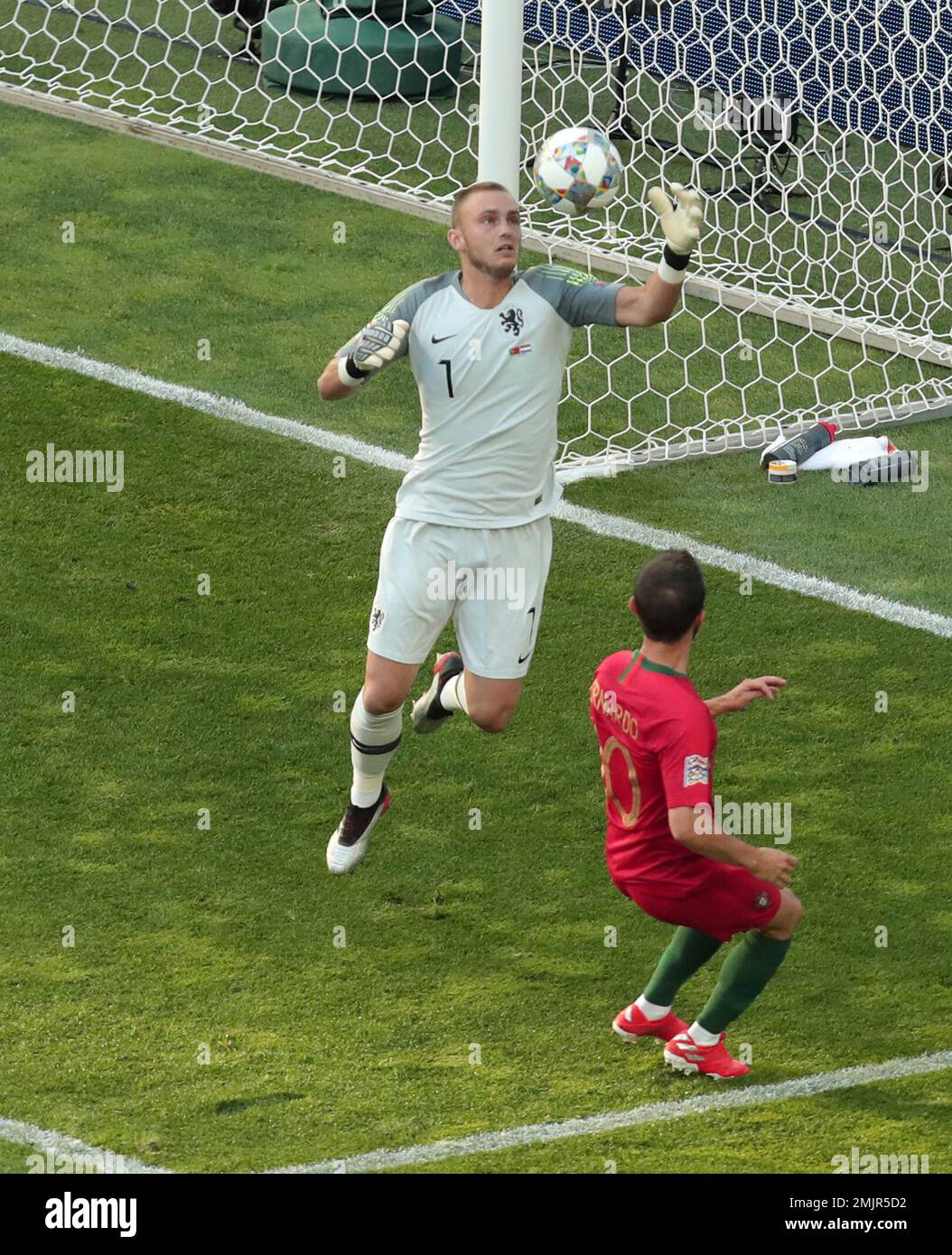 Netherlands goalkeeper Jasper Cillessen makes a save in front of ...