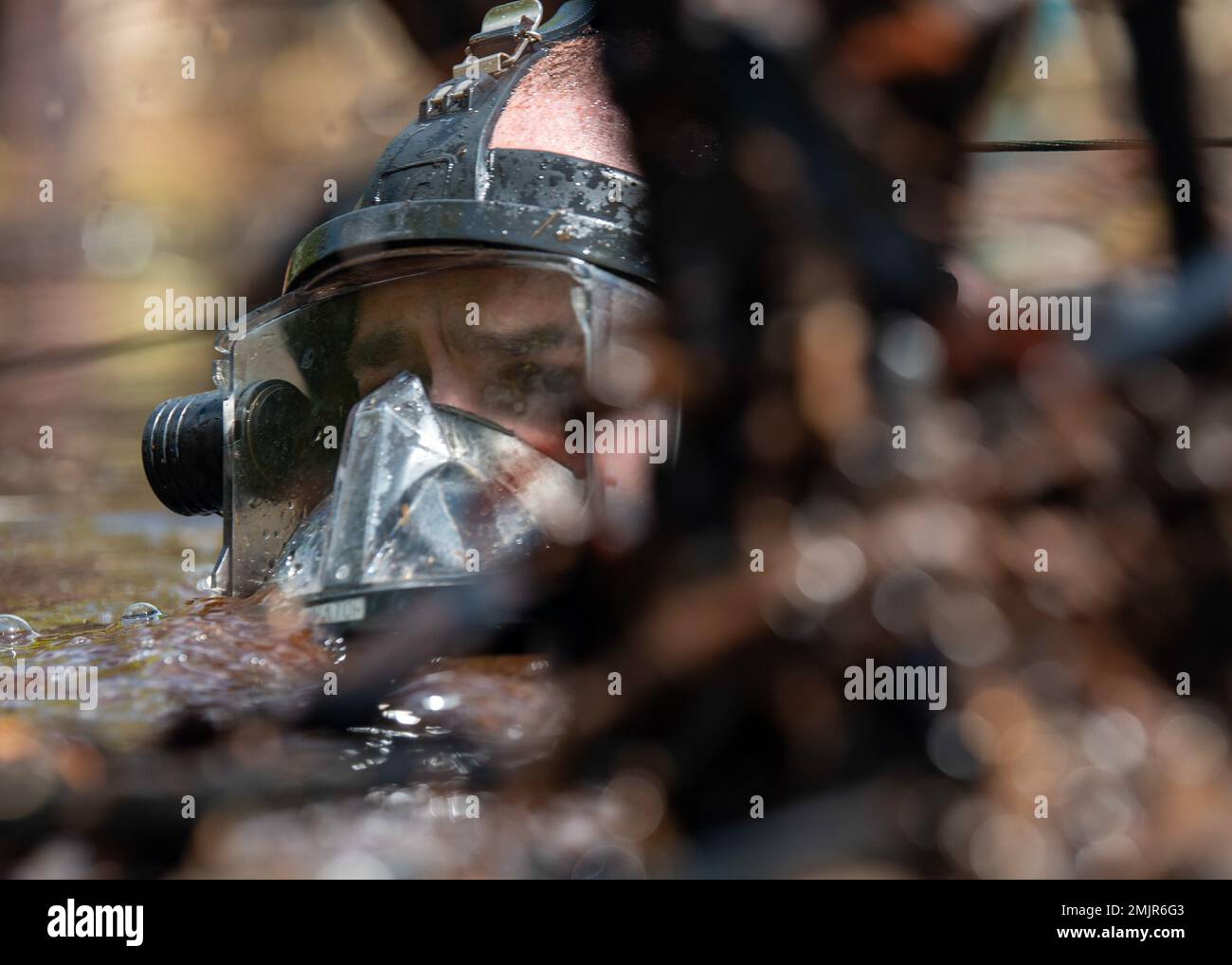 U.S. Navy Kevin Levey, a diver assigned to the Defense POW/MIA ...