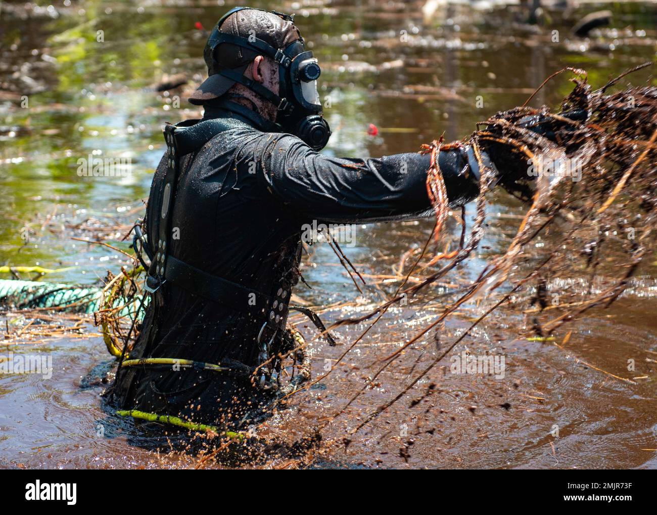 U.S. Navy Petty Officer First Class Lars Brown, a deep sea diver ...