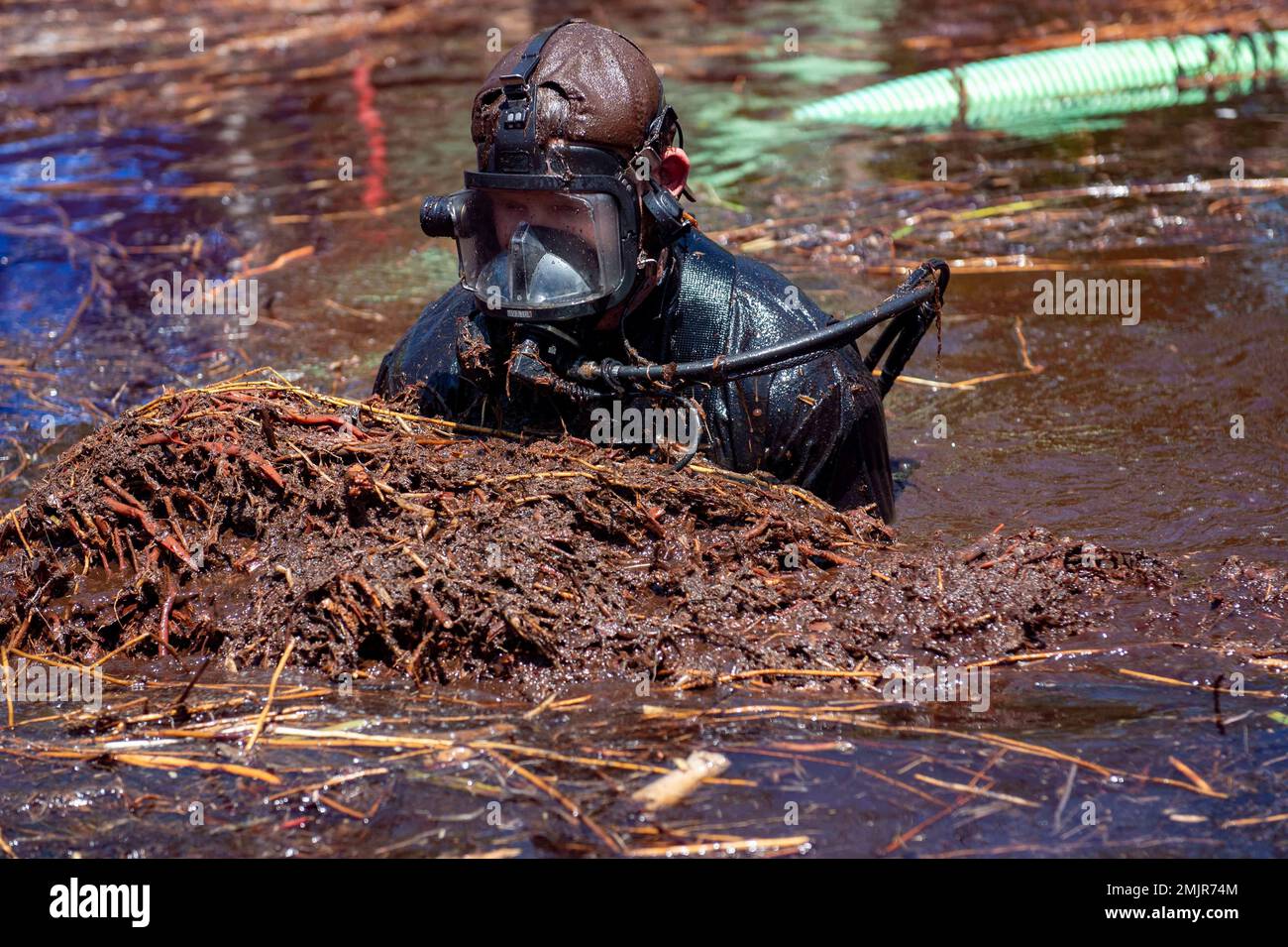 U.S. Navy Petty Officer First Class Lars Brown, a deep sea diver ...