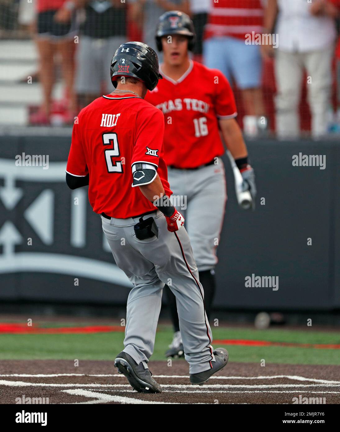 Texas Tech's Gabe Holt (2) scores the game-tying run during the ninth ...