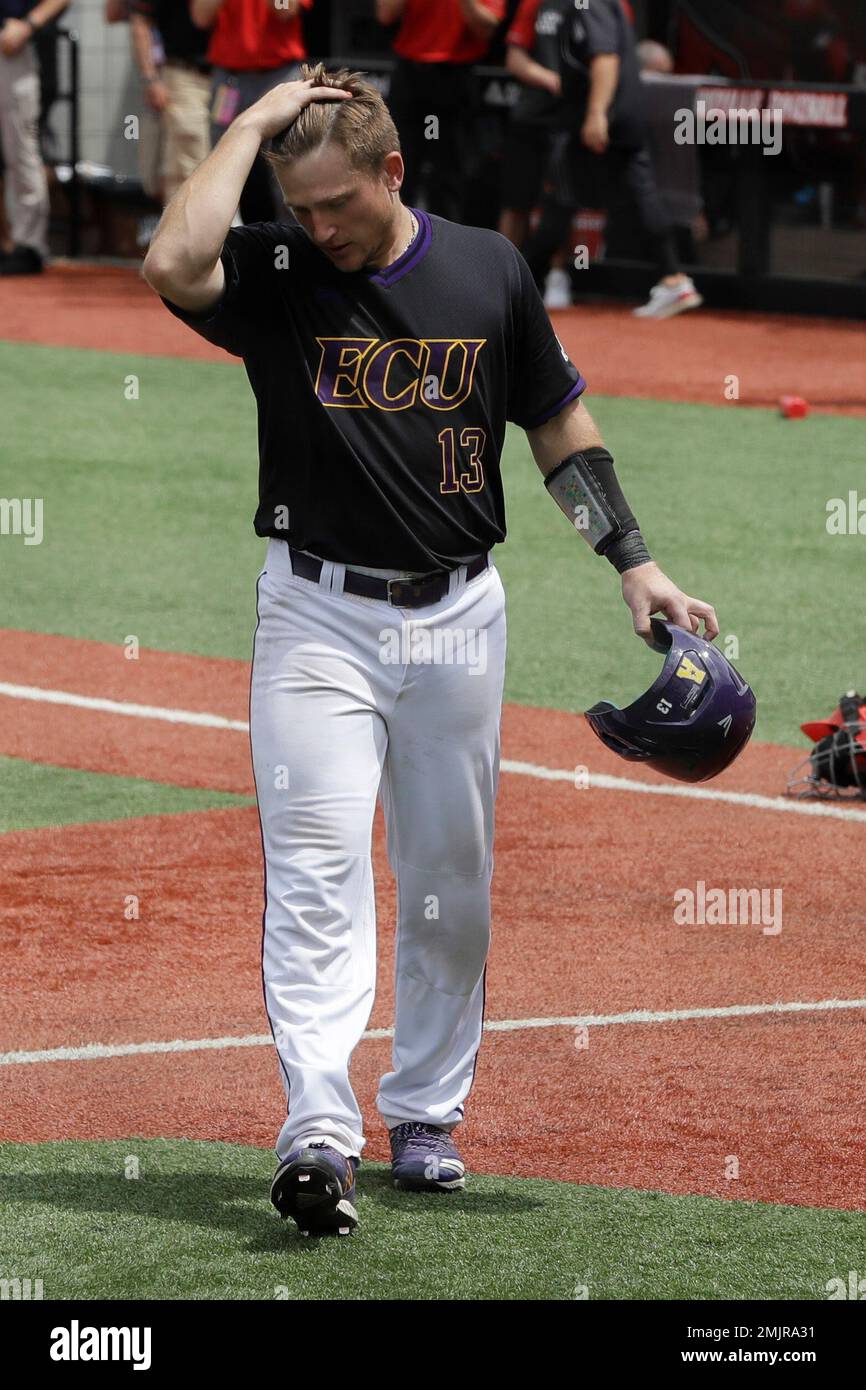 East Carolina's Jake Washer walks to the dugout as Louisville players ...